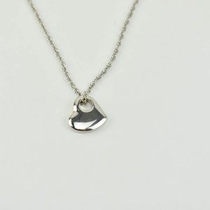 Givenchy | Jewelry | Givenchy Silver Metal Heart Logo Necklace Nz ...